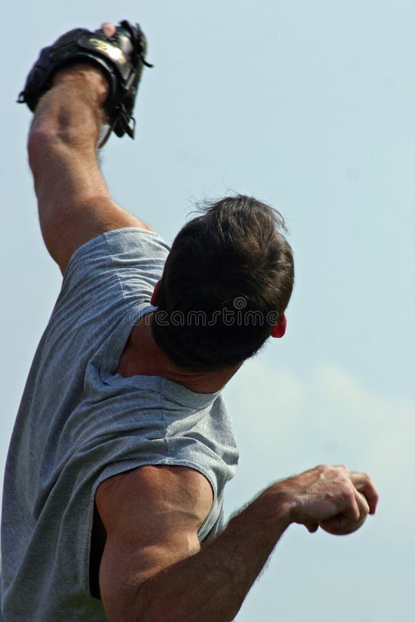 Man Throwing a Pop-up stock image. Image of playful, baseballs - 1243337