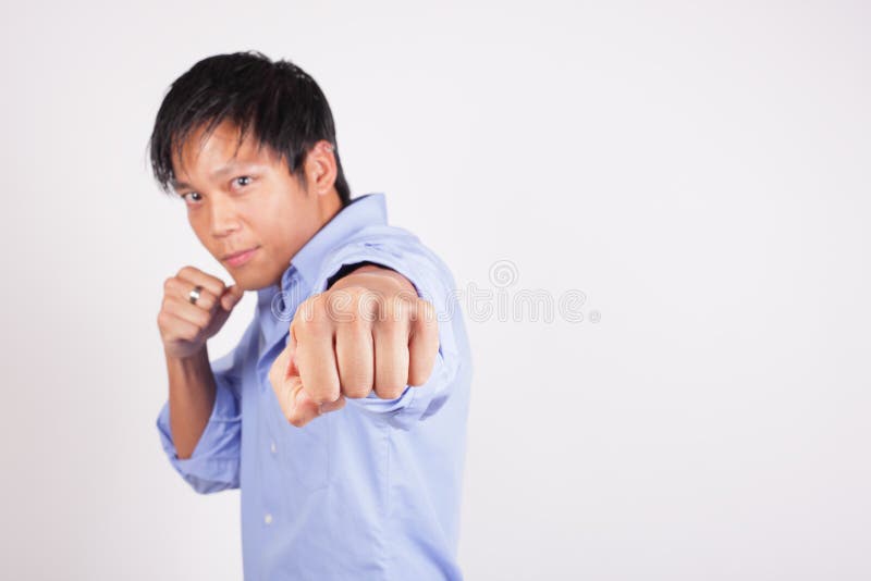 Man throwing a punch stock image. Image of fashionable - 22124843