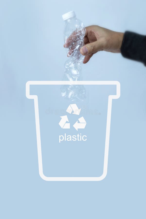 A Man Throws a Plastic Bottle into a Dumpster, Sorting and Recycling ...