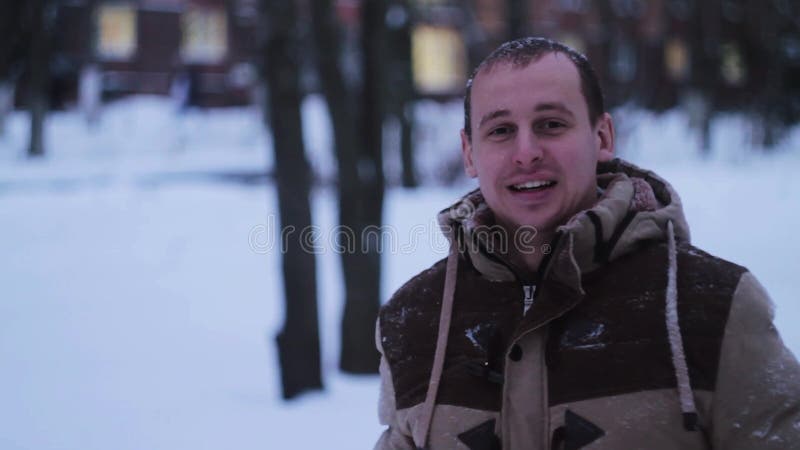 Man Throws a Snowball at the Camera Stock Video - Video of white, male ...