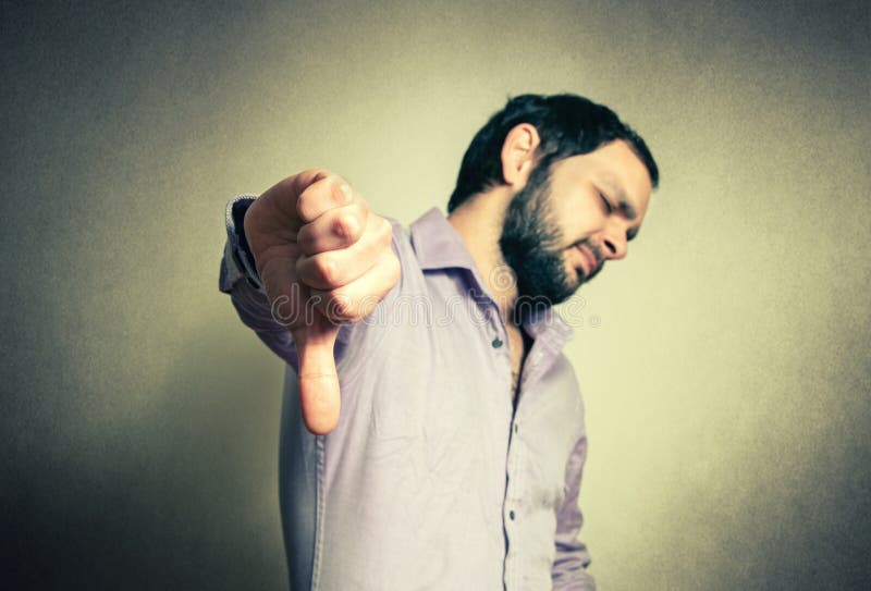 Man with the thumbs down stock photo. Image of hand, closeup - 69666670