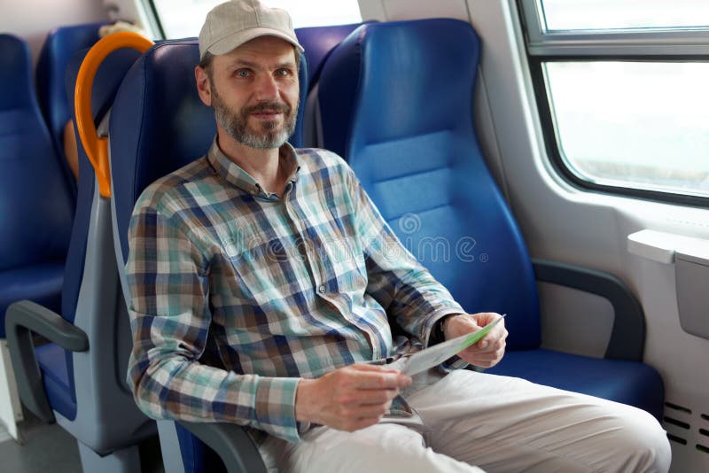 Man with Tickets in a Commuter Train Stock Image - Image of blue, italy ...