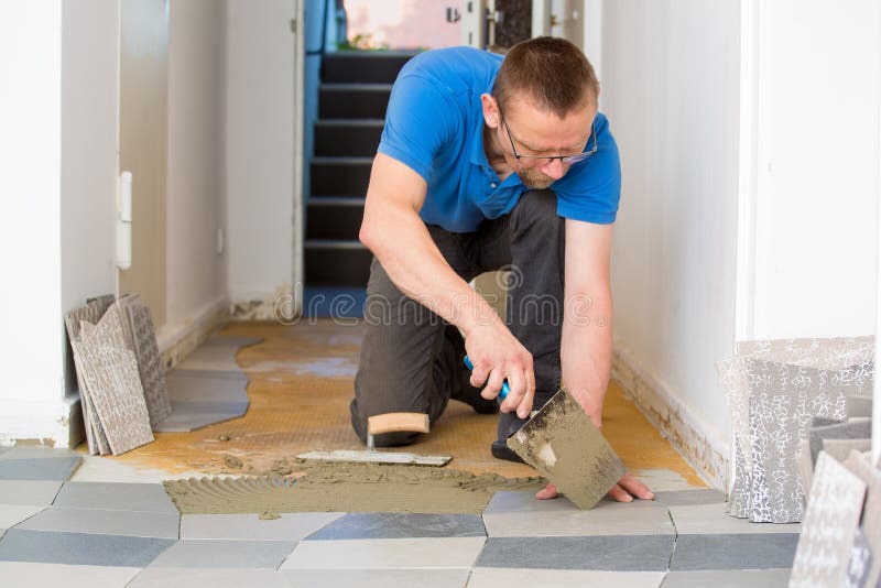 Tiler Placing New Floor Tiles Stock Photo - Image of interior, home ...