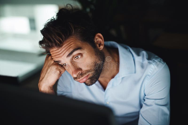 Man Tired And Bored With Computer At Night For Coding Programming And Software Development At