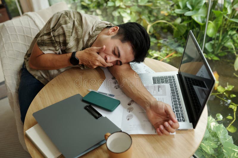 Man Tired of His Work stock photo. Image of workplace - 339084074