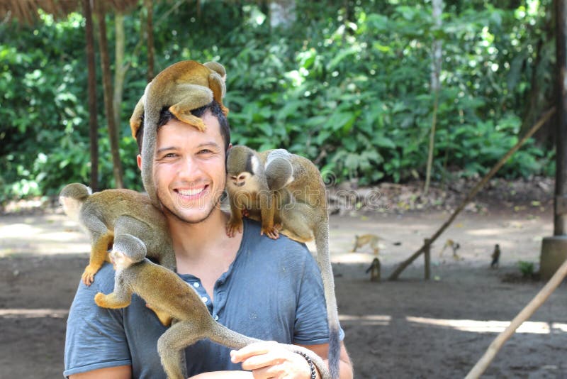 Man and Titi Monkeys in the Amazon Region Stock Photo - Image of forest ...