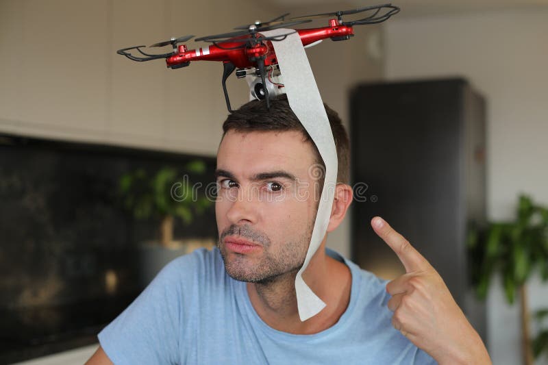Man about To Fly with Drone Attached To His Head Stock Image - Image of ...