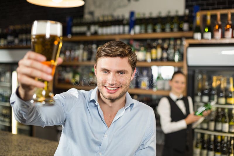Man toasting a beer stock photo. Image of young, dressed - 67731322
