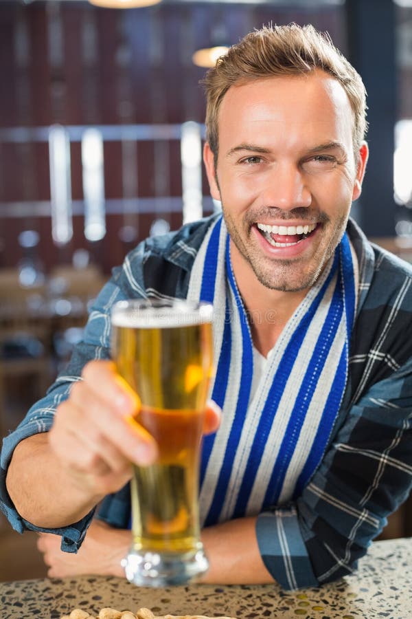 Man toasting a beer stock image. Image of food, entertaining - 67730617