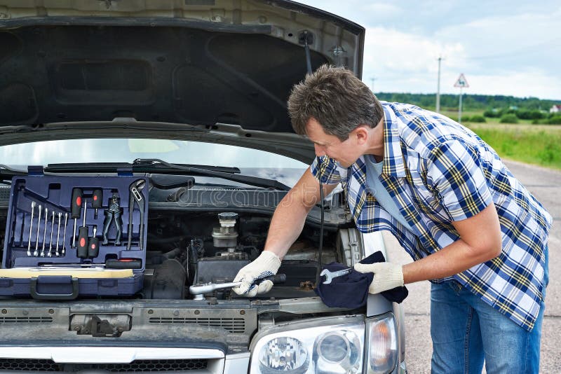 Man with Tools Repairs Broken Car Stock Photo - Image of fail, standing ...
