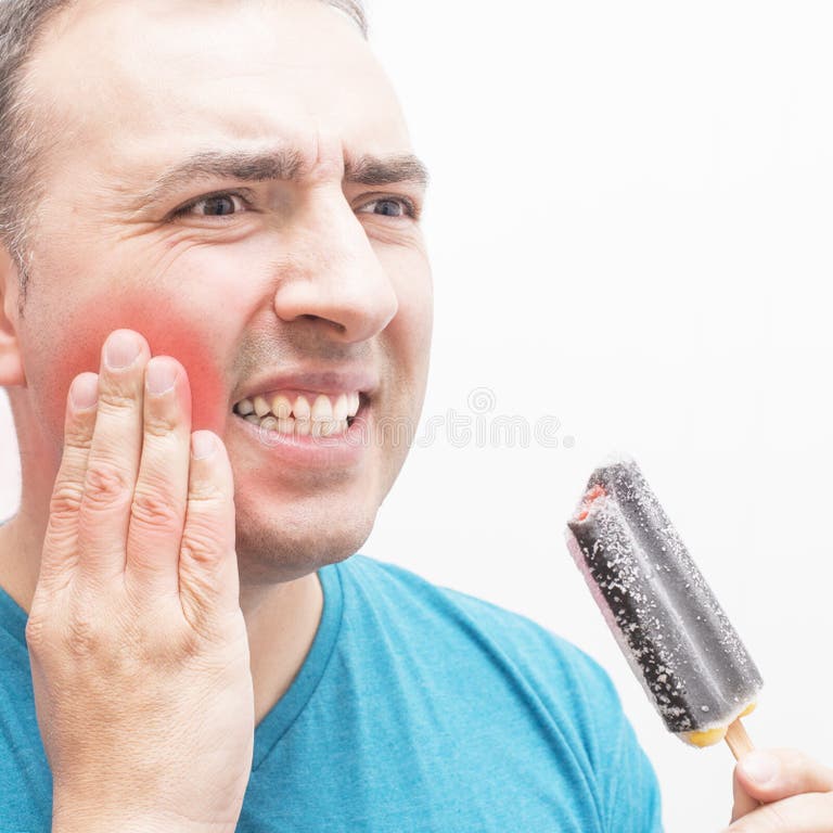 Man with a Toothache Eating Ice Cream Cold. Stock Photo - Image of ...