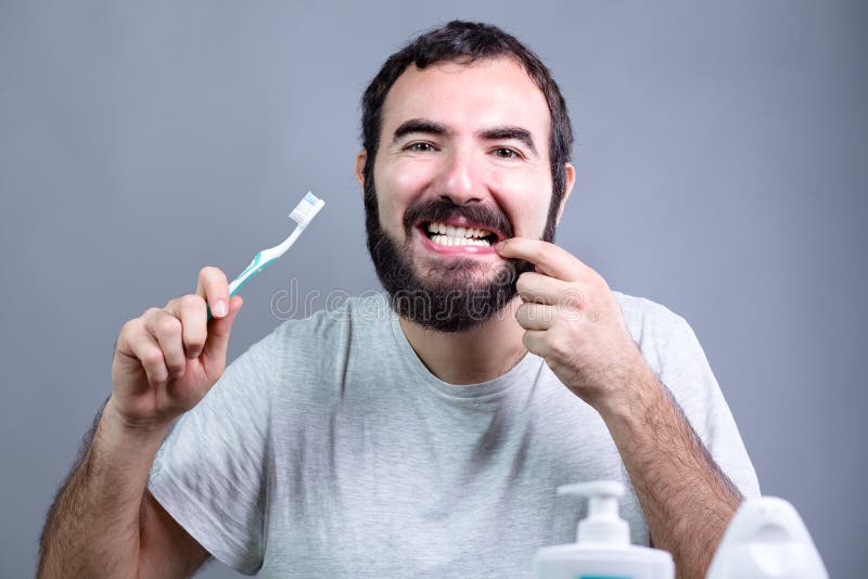 Man with Toothbrush stock photo. Image of shoulders, soap - 61400870