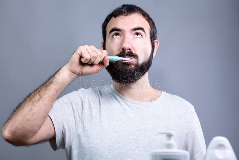 Man with Toothbrush stock photo. Image of beard, copy - 61361578