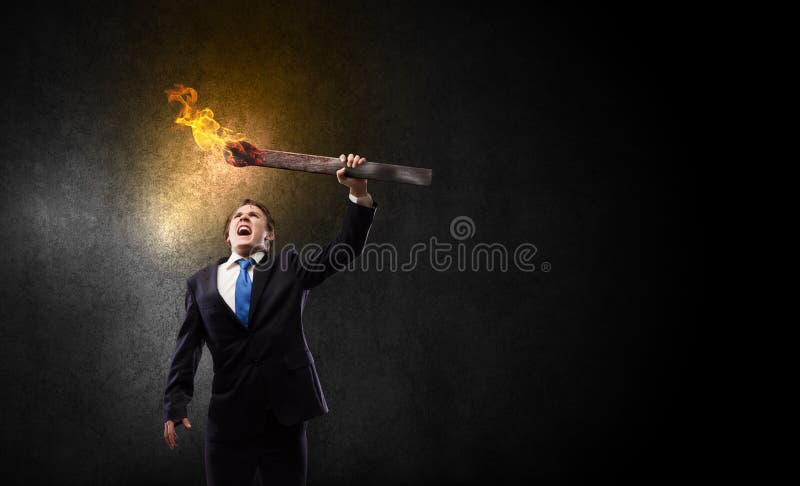Man with torch stock photo. Image of darkness, fire, leader - 43893450