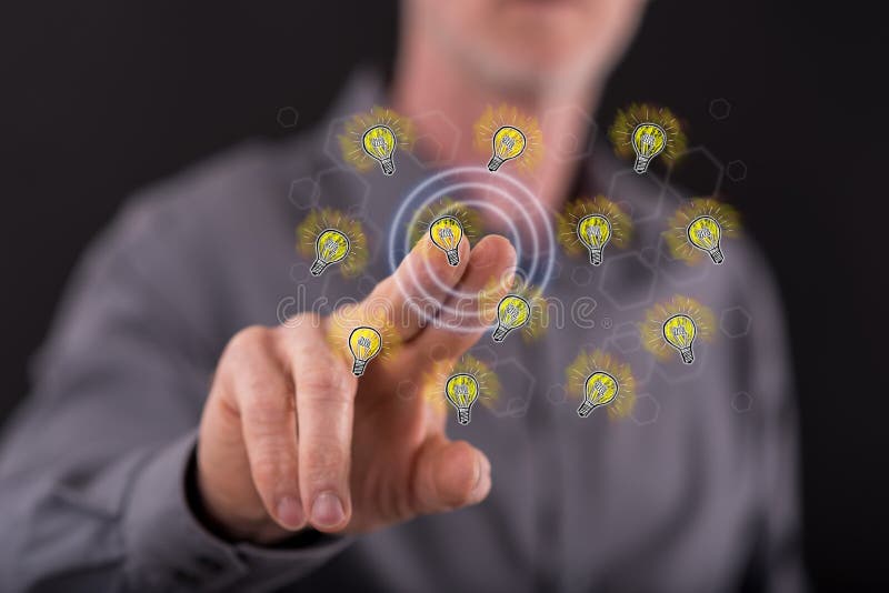 Man Touching Light Bulbs on a Touch Screen Stock Image - Image of ...