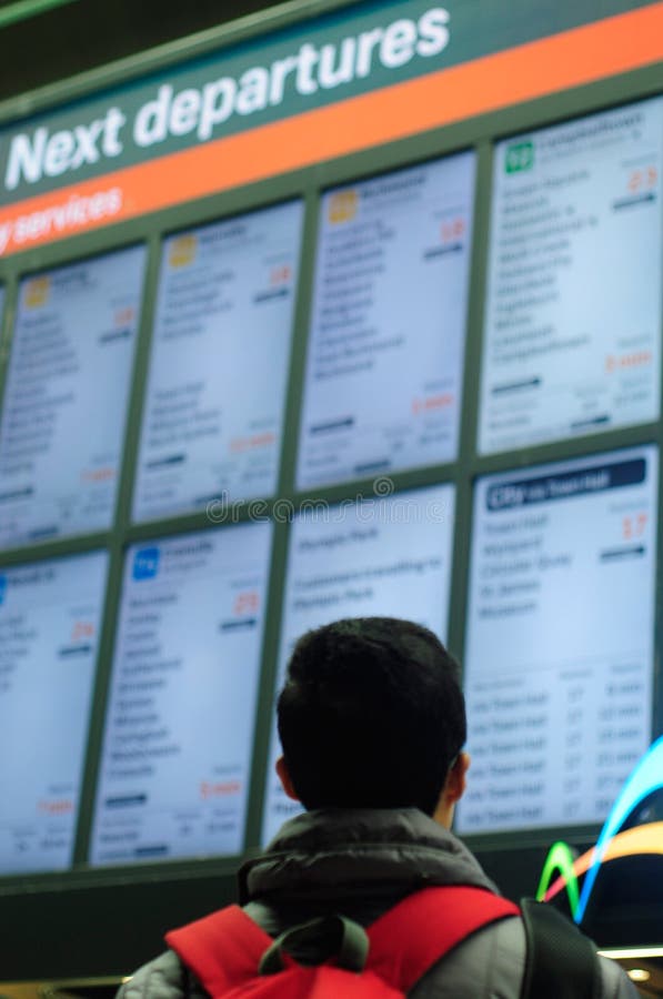 Train departure board editorial photo. Image of travel - 100435436