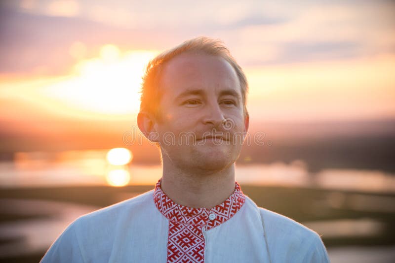 A Man in Traditional Russian Clothes Standing on the Field Stock Photo ...