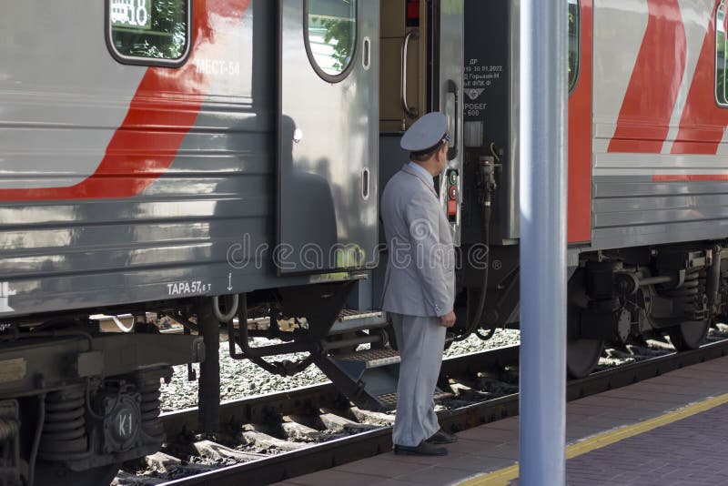 Train Conductor of Classic Old Potbelly Stove Train, Tsugaru Railway ...