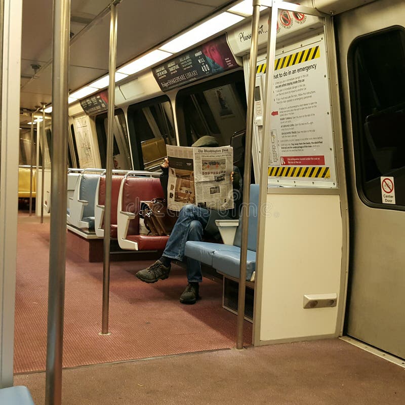 Man Reading Newspaper on a Train Editorial Stock Image - Image of ...