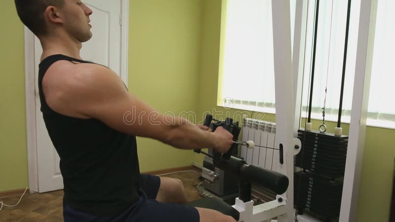 Man train on simulators stock footage. Video of muscle - 68260986