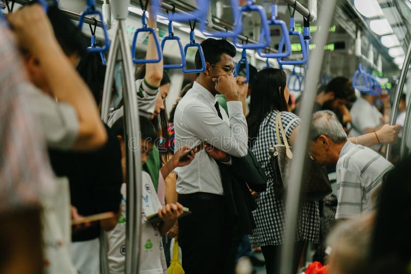Man in Train Standing stock image. Image of crowd, adult - 119844827