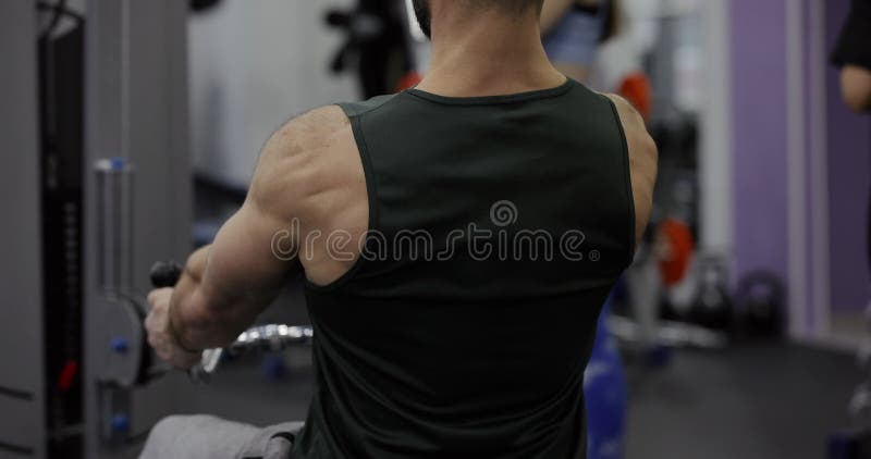 A Man Training Back Muscles at the Gym Stock Video - Video of ...