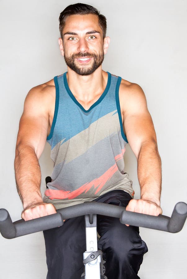 Man training on ergometer stock image. Image of caucasian - 46315383