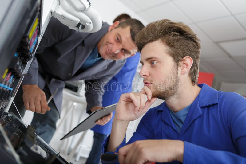 Man training new recruit stock photo. Image of produce - 99180854