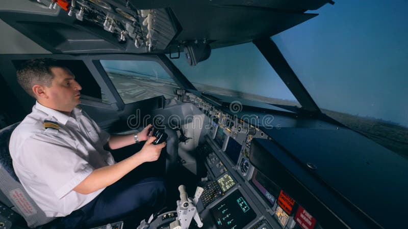 Man Training in a Plane Simulator, Side View. Stock Video - Video of ...
