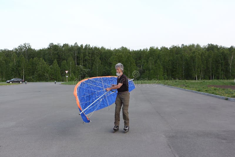 Man Training in Roller Skating with Kite Stock Image - Image of ride ...