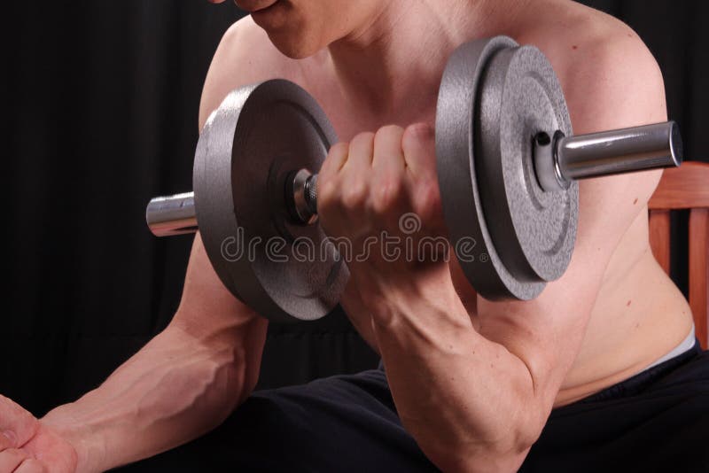 Man training with weight stock image. Image of male, build - 5395413