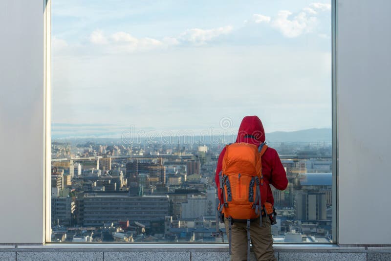 Man Travel with Backpack Looking Map on the Stairs of Building Stock ...