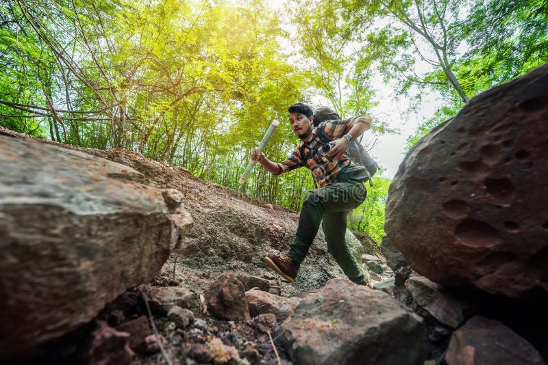 Man Traveler with Backpack Running in the Forest Stock Image - Image of ...