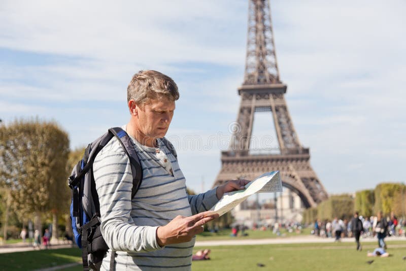 Woman Reading Book in Front of Eiffel Tower Stock Image - Image of ...