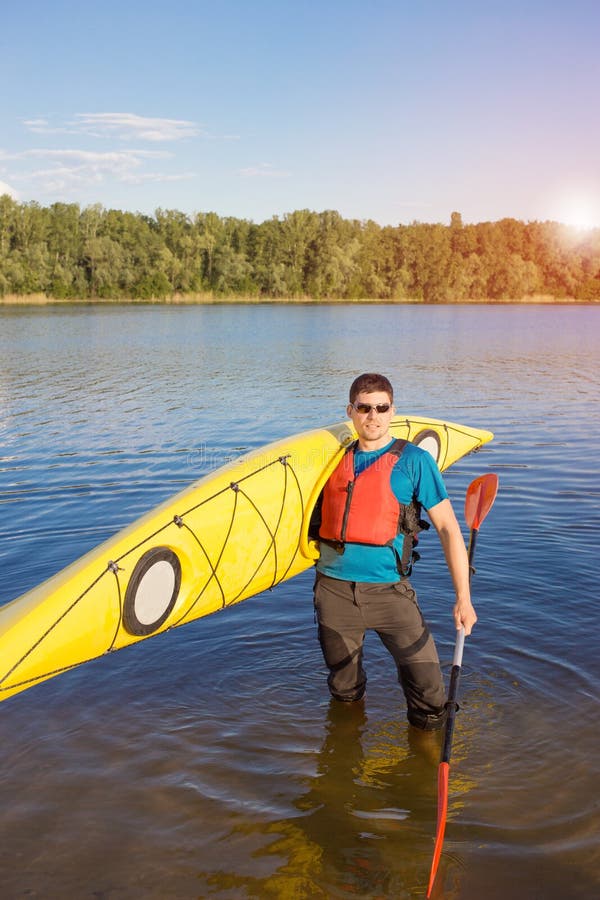 Man Traveling on the River in a Kayak . Stock Photo - Image of kayaks ...
