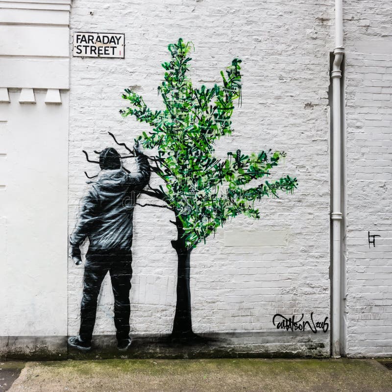 Man and tree graffiti editorial photography. Image of union - 82208017