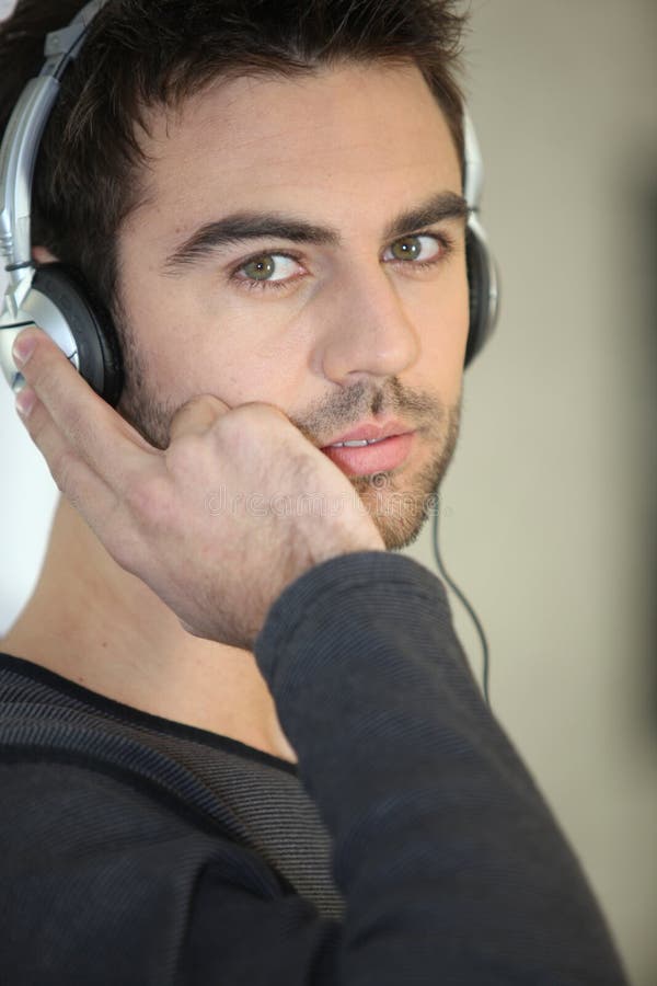 Man with trendy headphones stock image. Image of male - 22249687