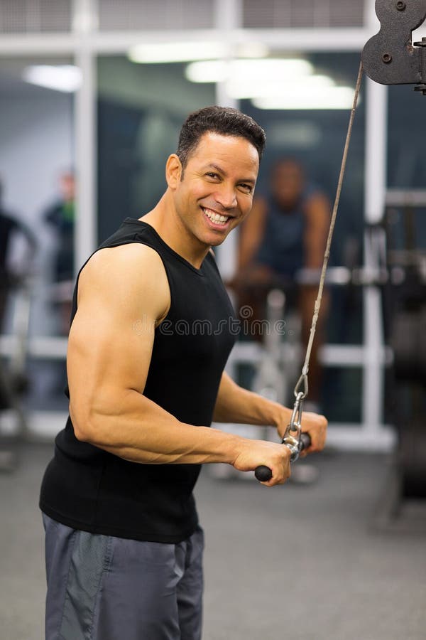 Man triceps pull down stock photo. Image of arms, active - 47296948