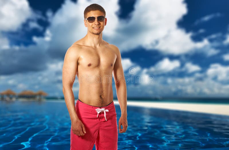 Man at Tropical Swimming Pool Stock Photo - Image of handsome, smile ...