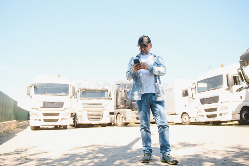Man Truck Driver Working with His Smartphone Stock Image - Image of ...