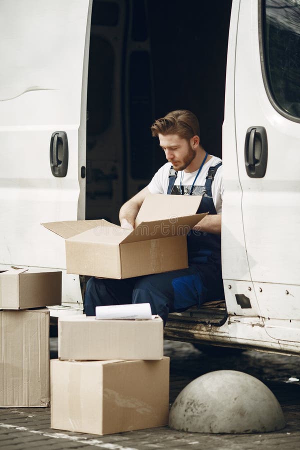 Delivery Man with Package Outdoors Stock Photo - Image of industry ...