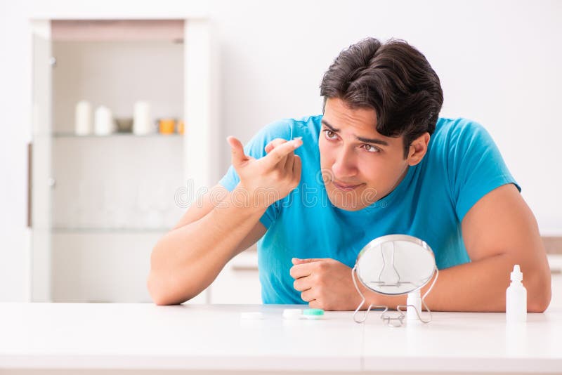 The Man Trying Contact Lenses at Home Stock Image - Image of inserting ...