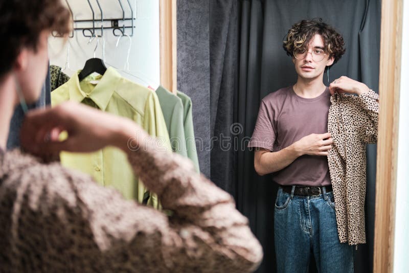 Man Trying on New Shirt in the Fitting Room Stock Image - Image of ...