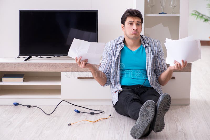 The Man Trying To Fix Broken Tv Stock Image - Image of digital ...