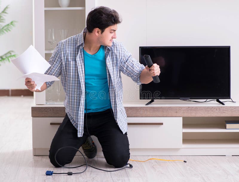 Man Trying To Fix Broken Tv Stock Image - Image of electronic ...