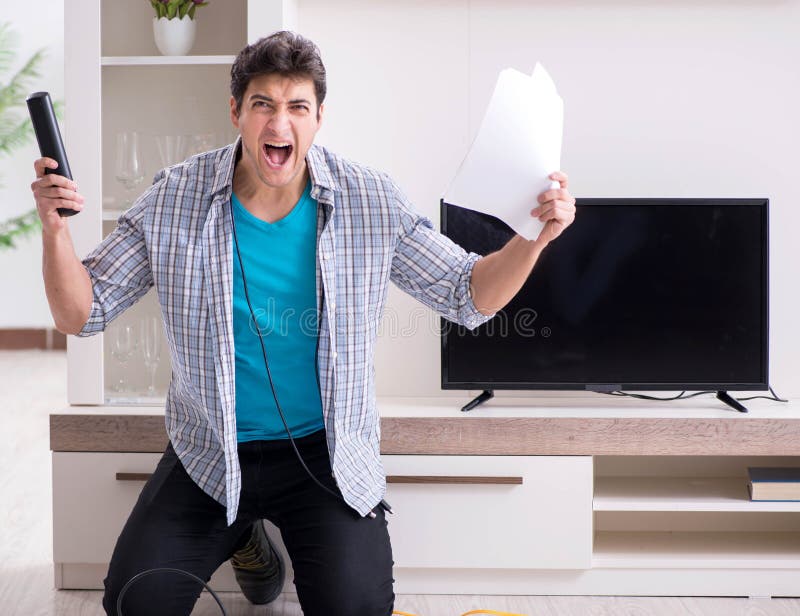 Man Trying To Fix Broken Tv Stock Photo - Image of handyman, connection ...