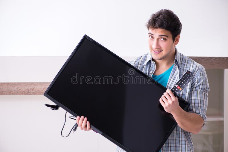 The Man Trying To Fix Broken Tv Stock Image - Image of cheerful ... The Man Trying To Fix Broken Tv Stock Image - Image of cheerful ...