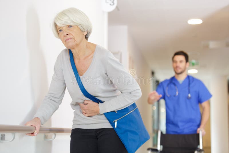 Man Trying To Help Female Senior Stock Photo - Image of agingprocess ...