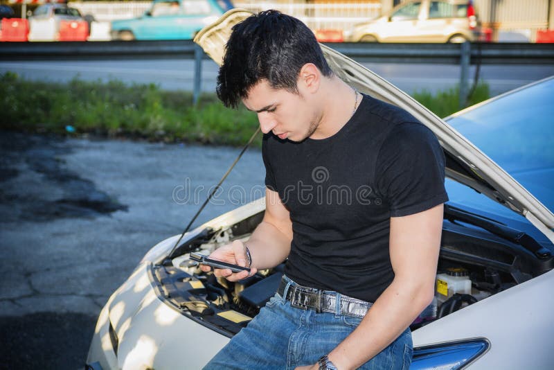Young Bored Man Sitting on Sofa Watching Stock Photo - Image of inside ...