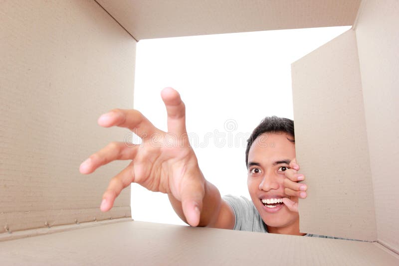 Man Trying To Take Something Inside Box Stock Photo - Image of happy ...